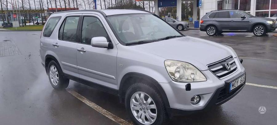 Grey Honda CR-V 2005 in Vilnius, with an engine capacity of 2.20 L and mileage of 180 thousand km for 6400 €, photo 4 on AUTOMOTO.COM.LV