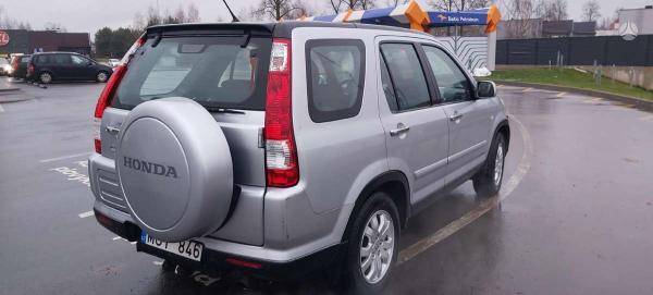 Grey Honda CR-V 2005 in Vilnius, with an engine capacity of 2.20 L and mileage of 180 thousand km for 6400 €, photo 5 on AUTOMOTO.COM.LV
