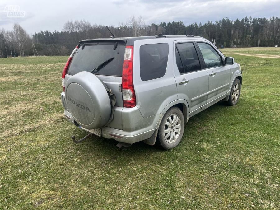 Pelēks Honda CR-V 2005 Ignalina, ar dzinēja tilpumu 2.20 L un nobraukumu 444 tūkst. km par 850 €, foto 4 vietnē AUTOMOTO.COM.LV