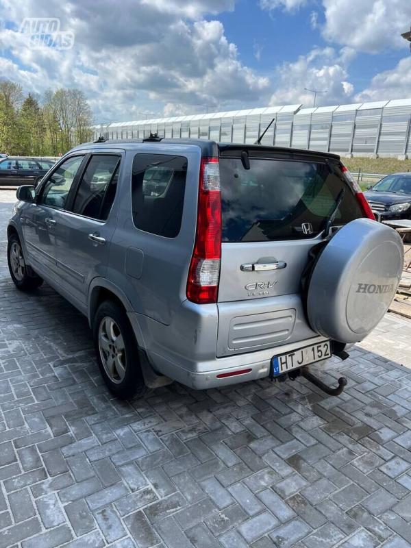 Pelēks Honda CR-V 2005 Marijampole, ar dzinēja tilpumu 2.20 L un nobraukumu 370 tūkst. km par 2200 €, foto 3 vietnē AUTOMOTO.COM.LV