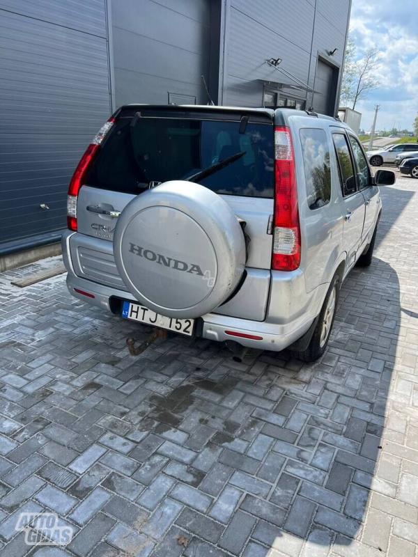 Pelēks Honda CR-V 2005 Marijampole, ar dzinēja tilpumu 2.20 L un nobraukumu 370 tūkst. km par 2200 €, foto 4 vietnē AUTOMOTO.COM.LV