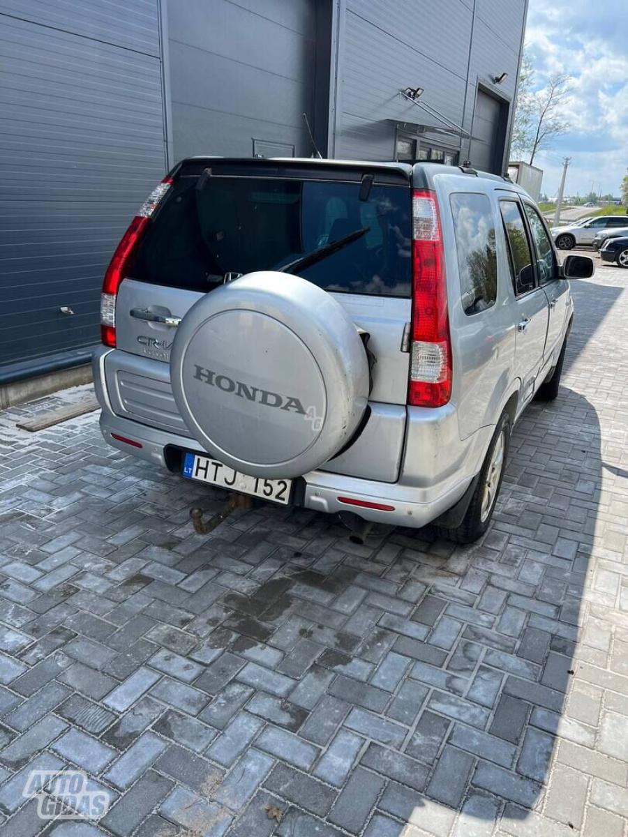 Grey Honda CR-V 2005 in Marijampole, with an engine capacity of 2.20 L and mileage of 370 thousand km for 2200 €, photo 5 on AUTOMOTO.COM.LV