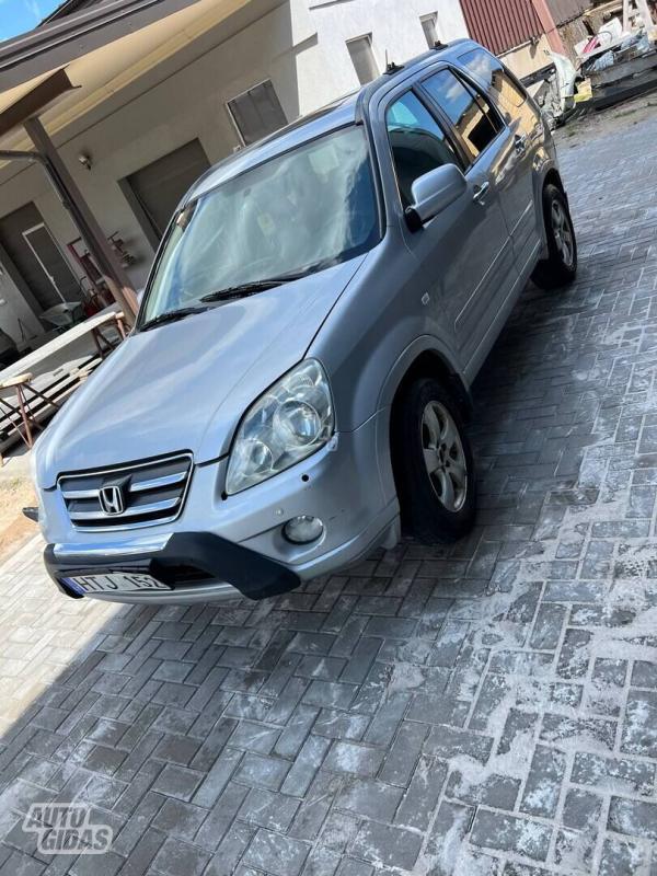 Pelēks Honda CR-V 2005 Marijampole, ar dzinēja tilpumu 2.20 L un nobraukumu 370 tūkst. km par 2200 €, foto 5 vietnē AUTOMOTO.COM.LV