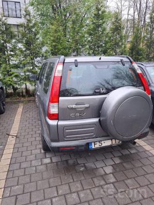 Grey Honda CR-V 2005 in Riga, with an engine capacity of 2.00 L and mileage of 246 thousand km for 1600 €, photo 8 on AUTOMOTO.COM.LV