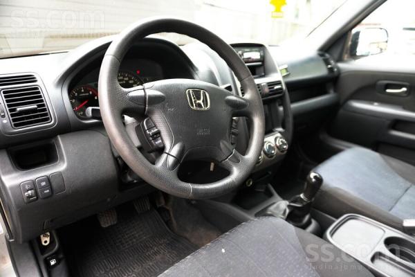 Pelēks Honda CR-V 2005 Rīga, ar dzinēja tilpumu 2.20 L un nobraukumu 418 tūkst. km par 2090 €, foto 6 vietnē AUTOMOTO.COM.LV