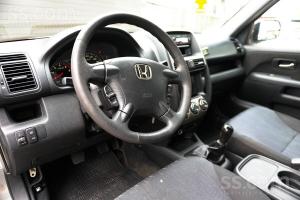 Pelēks Honda CR-V 2005 Rīga, ar dzinēja tilpumu 2.20 L un nobraukumu 418 tūkst. km par 2090 €, foto 7 vietnē AUTOMOTO.COM.LV