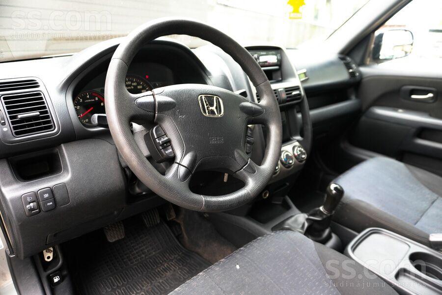 Pelēks Honda CR-V 2005 Rīga, ar dzinēja tilpumu 2.20 L un nobraukumu 418 tūkst. km par 2090 €, foto 7 vietnē AUTOMOTO.COM.LV