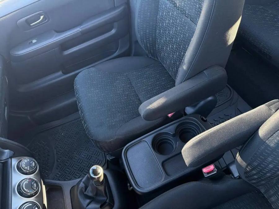 Pelēks Honda CR-V 2005 Rīga, ar dzinēja tilpumu 2.00 L un nobraukumu 215 tūkst. km par 2400 €, foto 13 vietnē AUTOMOTO.COM.LV