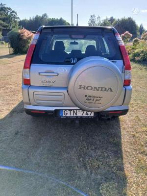 Grey Honda CR-V 2005 in Druskininkai, with an engine capacity of 2.20 L and mileage of 293 thousand km for 3500 €, photo 4 on AUTOMOTO.COM.LV