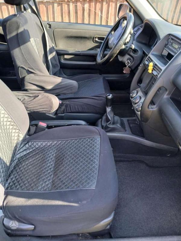 Pelēks Honda CR-V 2005 Druskininkai, ar dzinēja tilpumu 2.20 L un nobraukumu 293 tūkst. km par 3500 €, foto 5 vietnē AUTOMOTO.COM.LV