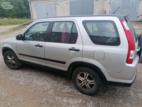 Grey Honda CR-V 2005 in Utena, with an engine capacity of 2.20 L and mileage of 396 thousand km for 1450 €, photo 10 on AUTOMOTO.COM.LV