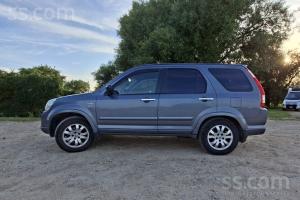 Pelēks Honda CR-V 2005 Liepāja, ar dzinēja tilpumu 2.00 L un nobraukumu 281 tūkst. km par 1990 €, foto  vietnē AUTOMOTO.COM.LV