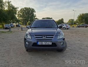 Pelēks Honda CR-V 2005 Liepāja, ar dzinēja tilpumu 2.00 L un nobraukumu 281 tūkst. km par 1990 €, foto 3 vietnē AUTOMOTO.COM.LV