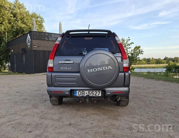 Pelēks Honda CR-V 2005 Liepāja, ar dzinēja tilpumu 2.00 L un nobraukumu 281 tūkst. km par 1990 €, foto 4 vietnē AUTOMOTO.COM.LV