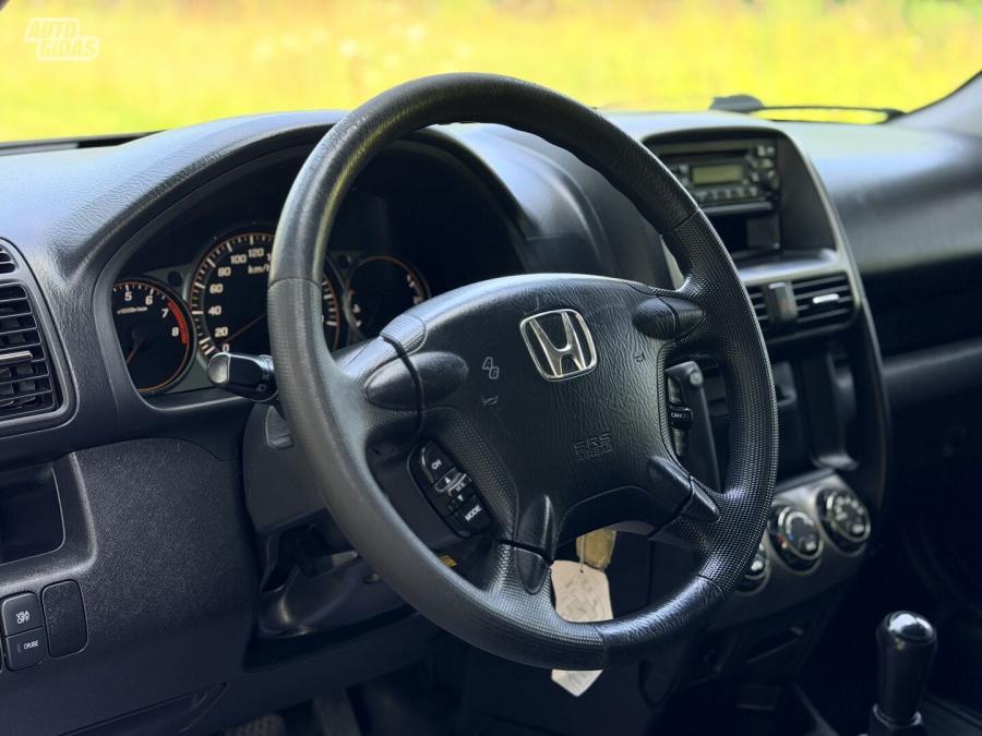 Pelēks Honda CR-V 2005 Utena, ar dzinēja tilpumu 2.00 L un nobraukumu 237 tūkst. km par 3990 €, foto 23 vietnē AUTOMOTO.COM.LV