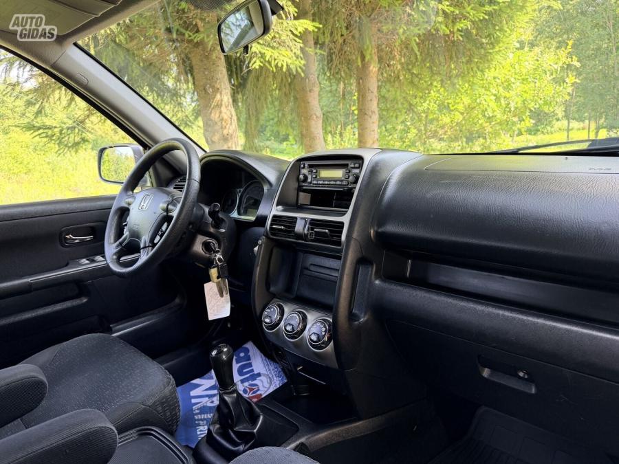Pelēks Honda CR-V 2005 Utena, ar dzinēja tilpumu 2.00 L un nobraukumu 237 tūkst. km par 3990 €, foto 25 vietnē AUTOMOTO.COM.LV