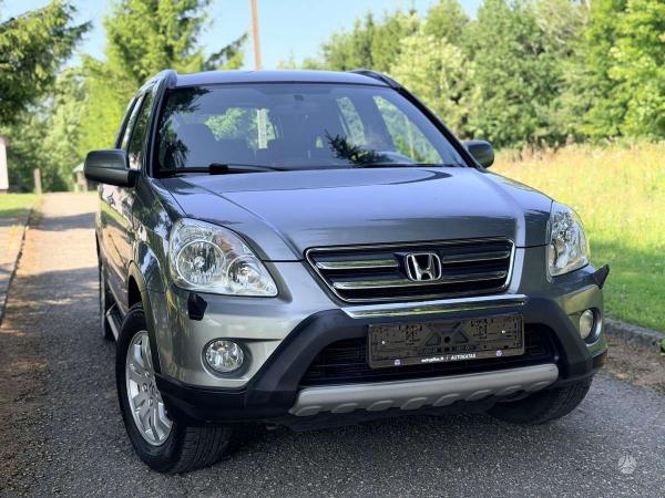 Pelēks Honda CR-V 2005 Utena, ar dzinēja tilpumu 2.00 L un nobraukumu 237 tūkst. km par 3990 €, foto 5 vietnē AUTOMOTO.COM.LV