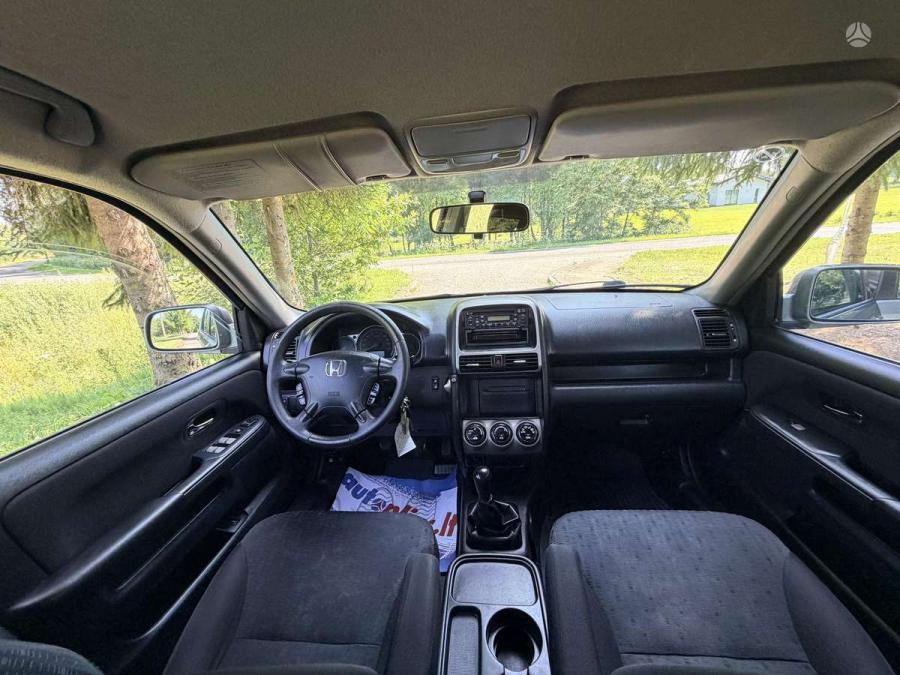 Pelēks Honda CR-V 2005 Utena, ar dzinēja tilpumu 2.00 L un nobraukumu 237 tūkst. km par 3990 €, foto 26 vietnē AUTOMOTO.COM.LV