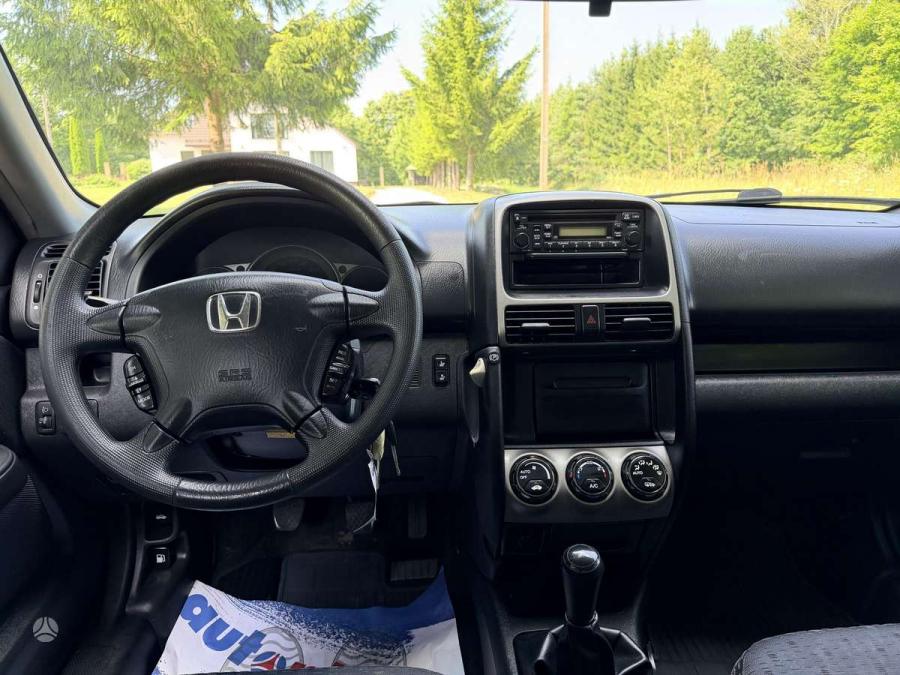 Pelēks Honda CR-V 2005 Utena, ar dzinēja tilpumu 2.00 L un nobraukumu 237 tūkst. km par 3990 €, foto 27 vietnē AUTOMOTO.COM.LV
