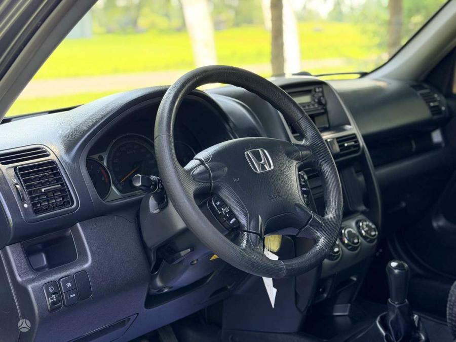 Pelēks Honda CR-V 2005 Utena, ar dzinēja tilpumu 2.00 L un nobraukumu 237 tūkst. km par 3990 €, foto 29 vietnē AUTOMOTO.COM.LV