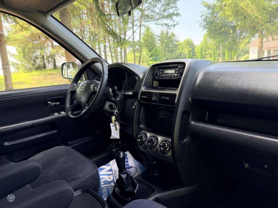Pelēks Honda CR-V 2005 Utena, ar dzinēja tilpumu 2.00 L un nobraukumu 237 tūkst. km par 3990 €, foto 31 vietnē AUTOMOTO.COM.LV