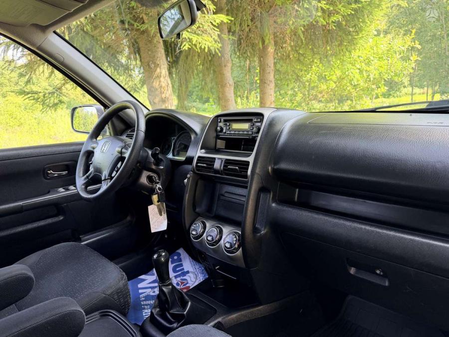 Pelēks Honda CR-V 2005 Utena, ar dzinēja tilpumu 2.00 L un nobraukumu 237 tūkst. km par 3990 €, foto 32 vietnē AUTOMOTO.COM.LV