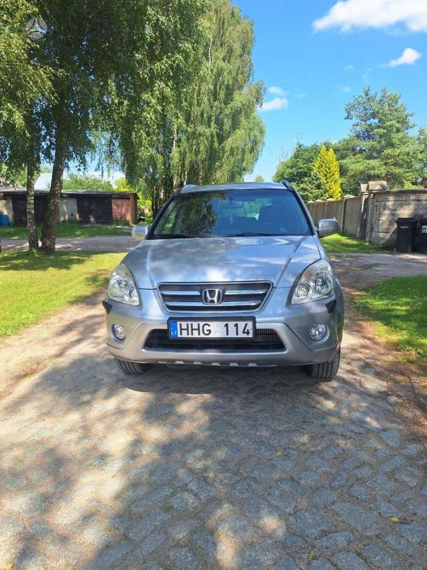 Grey Honda CR-V 2005 in Silute, with an engine capacity of 2.20 L and mileage of 344 thousand km for 3500 €, photo 4 on AUTOMOTO.COM.LV