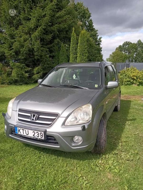 Grey Honda CR-V 2005 in Prienai, with an engine capacity of 2.20 L and mileage of 392 thousand km for 2100 €, photo 1 on AUTOMOTO.COM.LV