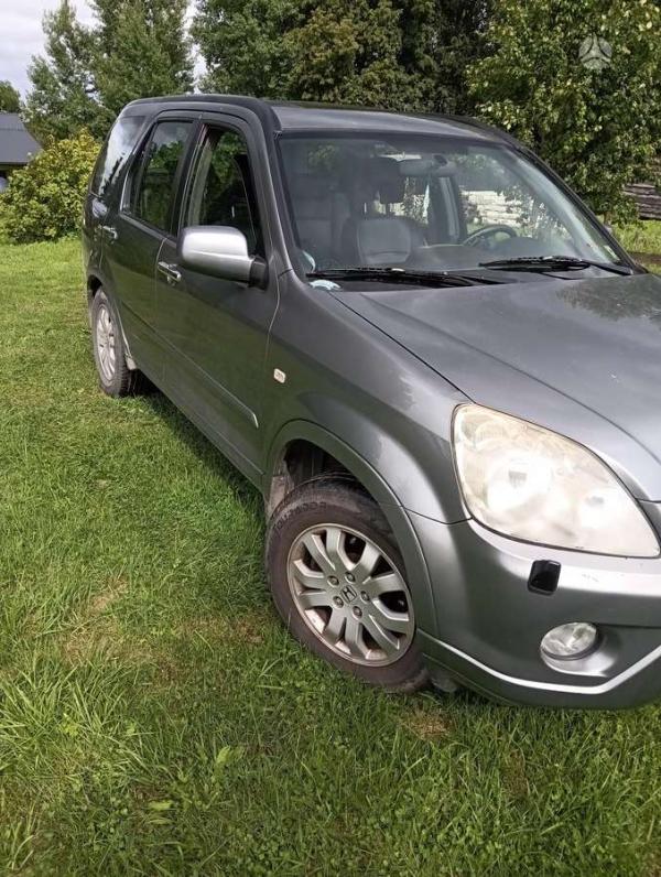 Grey Honda CR-V 2005 in Prienai, with an engine capacity of 2.20 L and mileage of 392 thousand km for 2100 €, photo 2 on AUTOMOTO.COM.LV