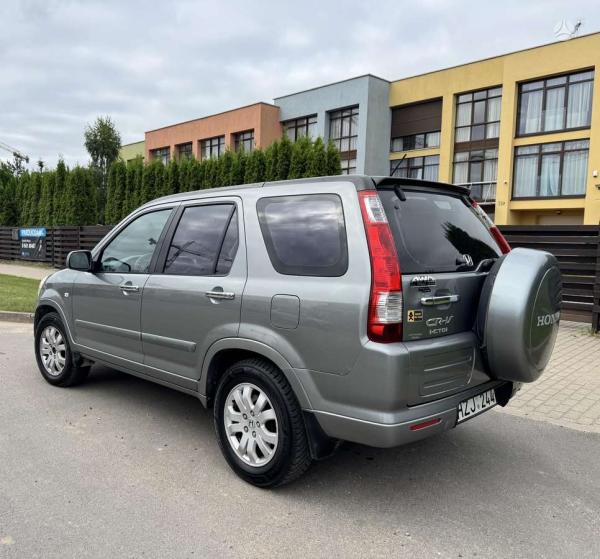 Grey Honda CR-V 2005 in Vilnius, with an engine capacity of 2.20 L and mileage of 350 thousand km for 2500 €, photo 6 on AUTOMOTO.COM.LV