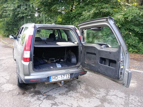 Pelēks Honda CR-V 2005 Rīga, ar dzinēja tilpumu 2.20 L un nobraukumu 261 tūkst. km par 2000 €, foto 8 vietnē AUTOMOTO.COM.LV