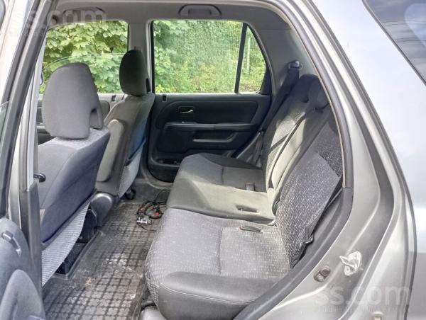 Pelēks Honda CR-V 2005 Rīga, ar dzinēja tilpumu 2.20 L un nobraukumu 261 tūkst. km par 2000 €, foto 9 vietnē AUTOMOTO.COM.LV