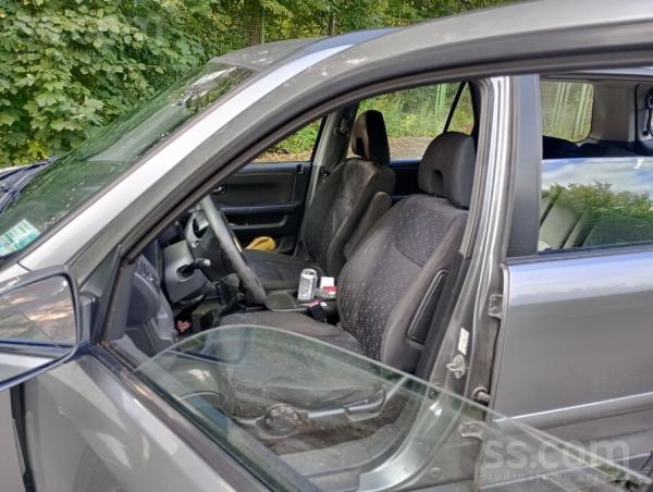 Pelēks Honda CR-V 2005 Rīga, ar dzinēja tilpumu 2.20 L un nobraukumu 261 tūkst. km par 2000 €, foto 10 vietnē AUTOMOTO.COM.LV