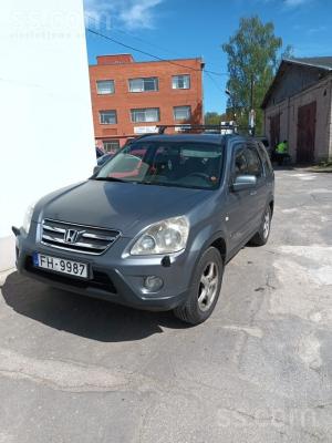 Pelēks Honda CR-V 2005 Rīga, ar dzinēja tilpumu 2.00 L un nobraukumu 312 tūkst. km par 1700 €, foto  vietnē AUTOMOTO.COM.LV