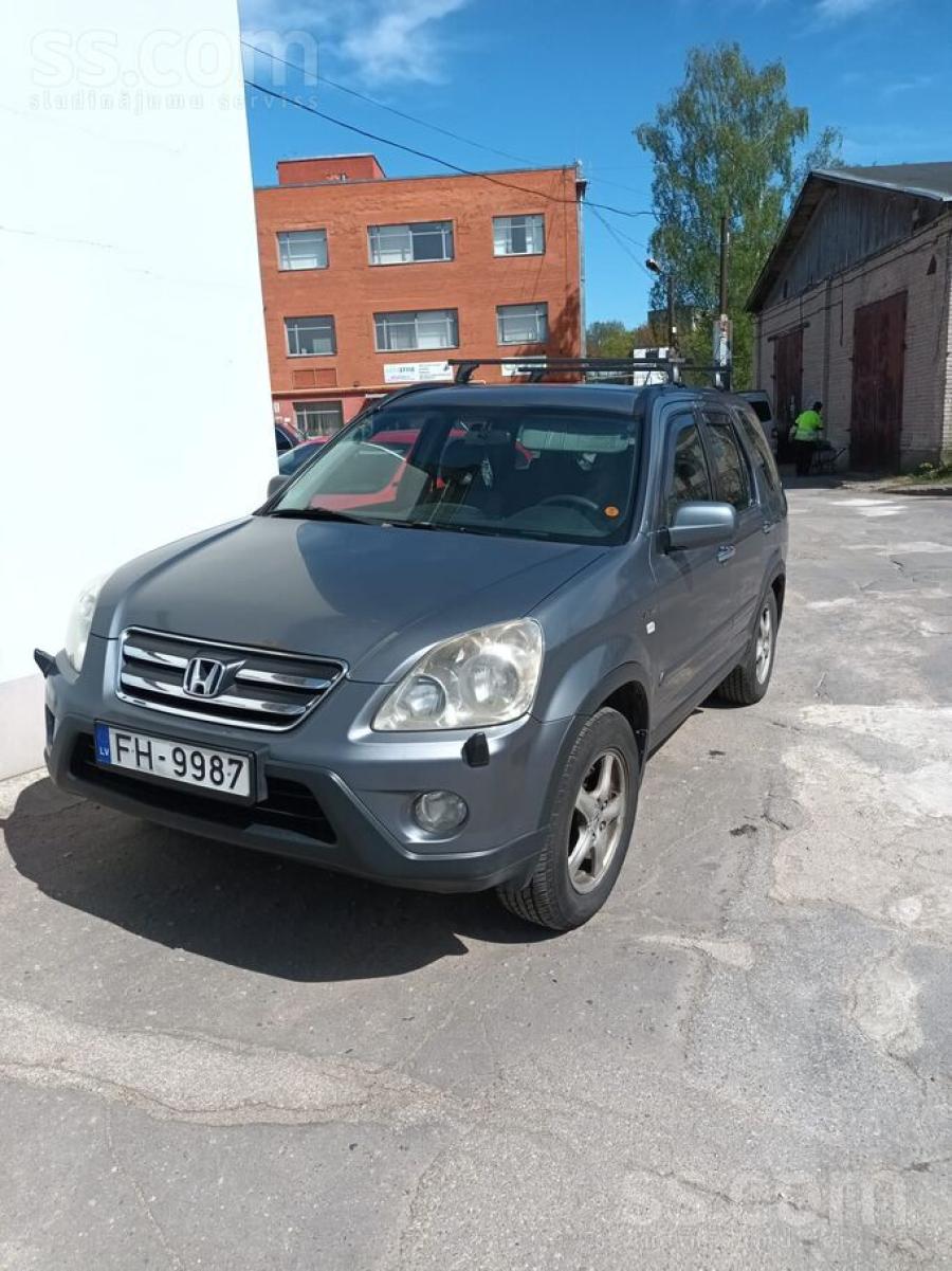 Pelēks Honda CR-V 2005 Rīga, ar dzinēja tilpumu 2.00 L un nobraukumu 312 tūkst. km par 1700 €, foto 1 vietnē AUTOMOTO.COM.LV