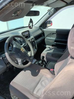 Pelēks Honda CR-V 2005 Rīga, ar dzinēja tilpumu 2.00 L un nobraukumu 312 tūkst. km par 1700 €, foto 3 vietnē AUTOMOTO.COM.LV