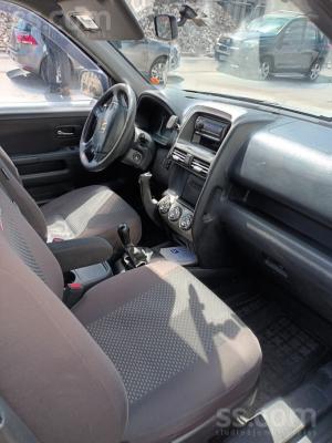Pelēks Honda CR-V 2005 Rīga, ar dzinēja tilpumu 2.00 L un nobraukumu 312 tūkst. km par 1700 €, foto 4 vietnē AUTOMOTO.COM.LV