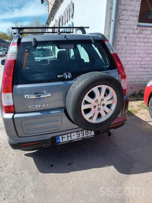 Pelēks Honda CR-V 2005 Rīga, ar dzinēja tilpumu 2.00 L un nobraukumu 312 tūkst. km par 1700 €, foto 8 vietnē AUTOMOTO.COM.LV