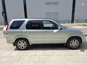 Grey Honda CR-V 2005 in Vilnius, with an engine capacity of 2.20 L and mileage of 301 thousand km for 2200 €, photo 5 on AUTOMOTO.COM.LV