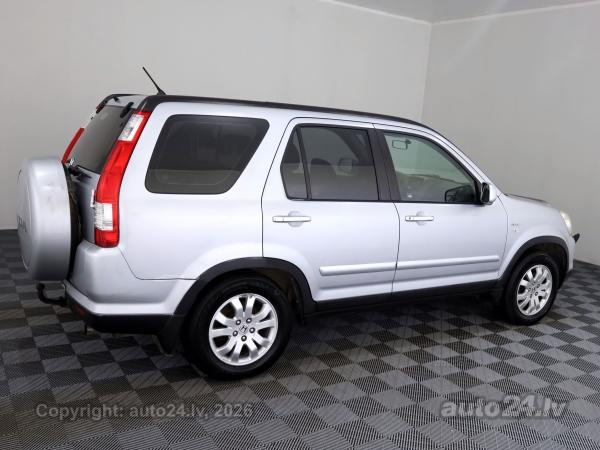 Grey Honda CR-V 2005 in Tallinn, with an engine capacity of 2.00 L and mileage of 297 thousand km for 1199 €, photo 4 on AUTOMOTO.COM.LV