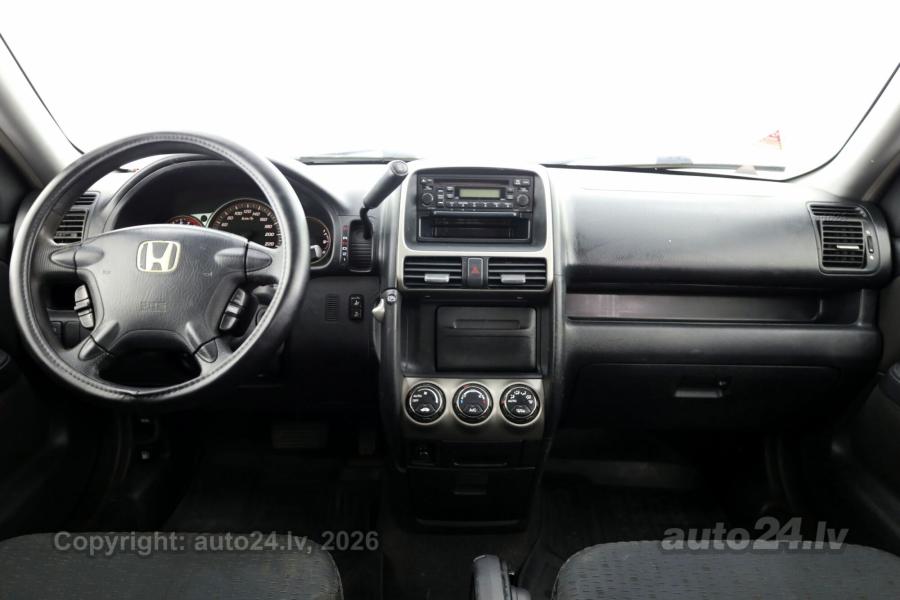 Grey Honda CR-V 2005 in Tallinn, with an engine capacity of 2.00 L and mileage of 297 thousand km for 1199 €, photo 6 on AUTOMOTO.COM.LV