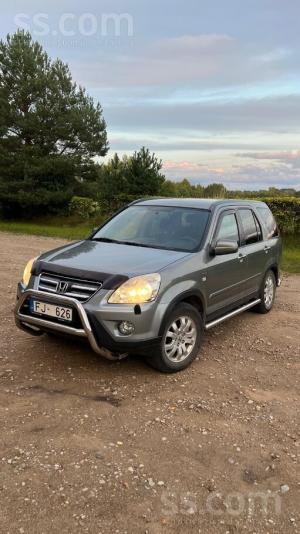 Pelēks Honda CR-V 2005 Gulbene, ar dzinēja tilpumu 2.00 L un nobraukumu 240 tūkst. km par 2450 €, foto  vietnē AUTOMOTO.COM.LV