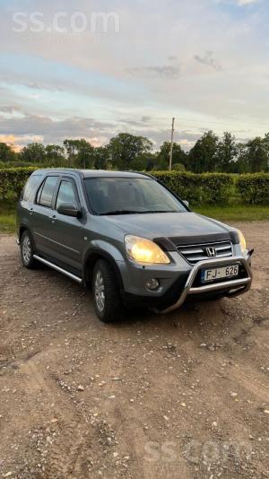 Pelēks Honda CR-V 2005 Gulbene, ar dzinēja tilpumu 2.00 L un nobraukumu 240 tūkst. km par 2450 €, foto 6 vietnē AUTOMOTO.COM.LV