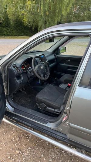 Pelēks Honda CR-V 2005 Gulbene, ar dzinēja tilpumu 2.00 L un nobraukumu 240 tūkst. km par 2450 €, foto 7 vietnē AUTOMOTO.COM.LV