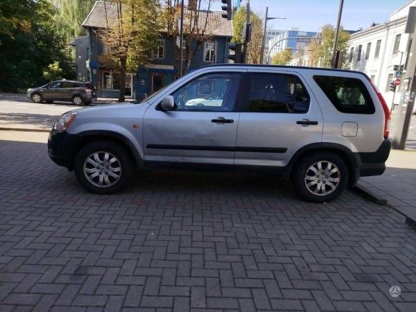 Grey Honda CR-V 2005 in Kaunas, with an engine capacity of 2.35 L and mileage of 182 thousand km for 1800 €, photo 11 on AUTOMOTO.COM.LV
