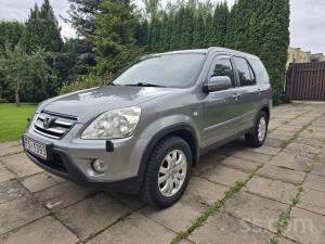 Pelēks Honda CR-V 2005 Cēsis, ar dzinēja tilpumu 2.00 L un nobraukumu 227 tūkst. km par 2450 €, foto 4 vietnē AUTOMOTO.COM.LV