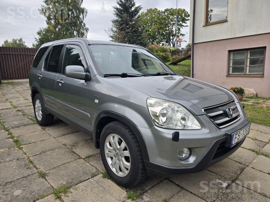 Pelēks Honda CR-V 2005 Cēsis, ar dzinēja tilpumu 2.00 L un nobraukumu 227 tūkst. km par 2450 €, foto 5 vietnē AUTOMOTO.COM.LV
