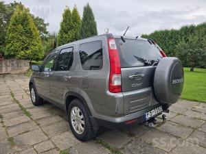 Pelēks Honda CR-V 2005 Cēsis, ar dzinēja tilpumu 2.00 L un nobraukumu 227 tūkst. km par 2450 €, foto 6 vietnē AUTOMOTO.COM.LV