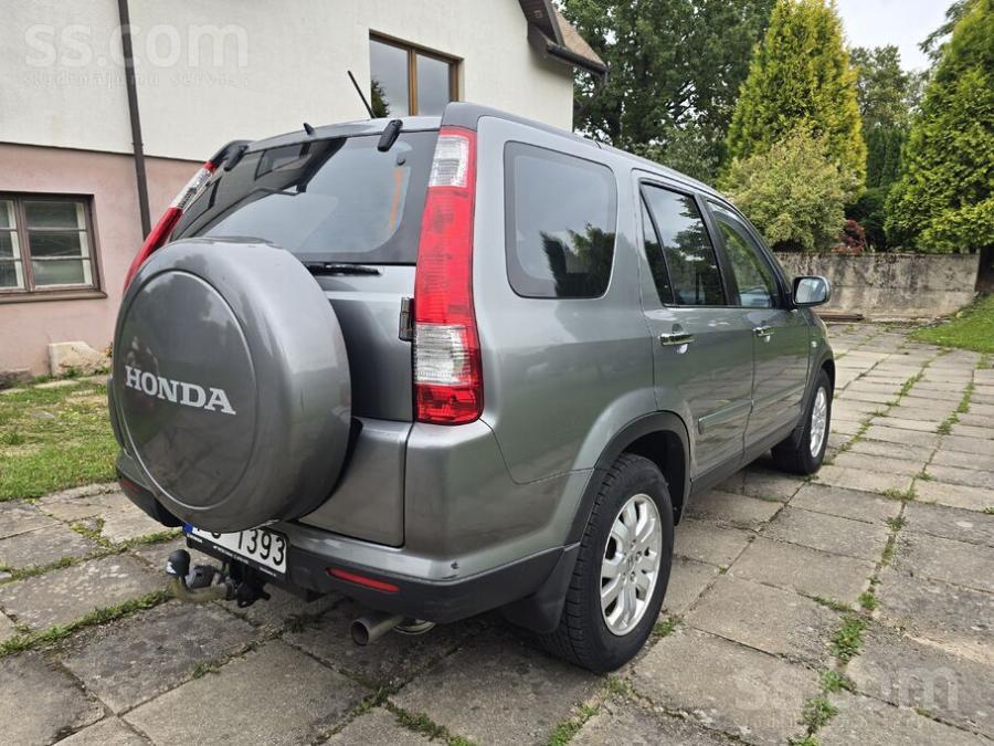 Pelēks Honda CR-V 2005 Cēsis, ar dzinēja tilpumu 2.00 L un nobraukumu 227 tūkst. km par 2450 €, foto 7 vietnē AUTOMOTO.COM.LV