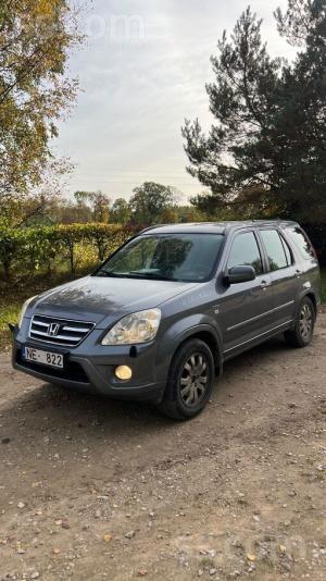 Pelēks Honda CR-V 2005 Gulbene, ar dzinēja tilpumu 2.00 L un nobraukumu 430 tūkst. km par 2450 €, foto  vietnē AUTOMOTO.COM.LV